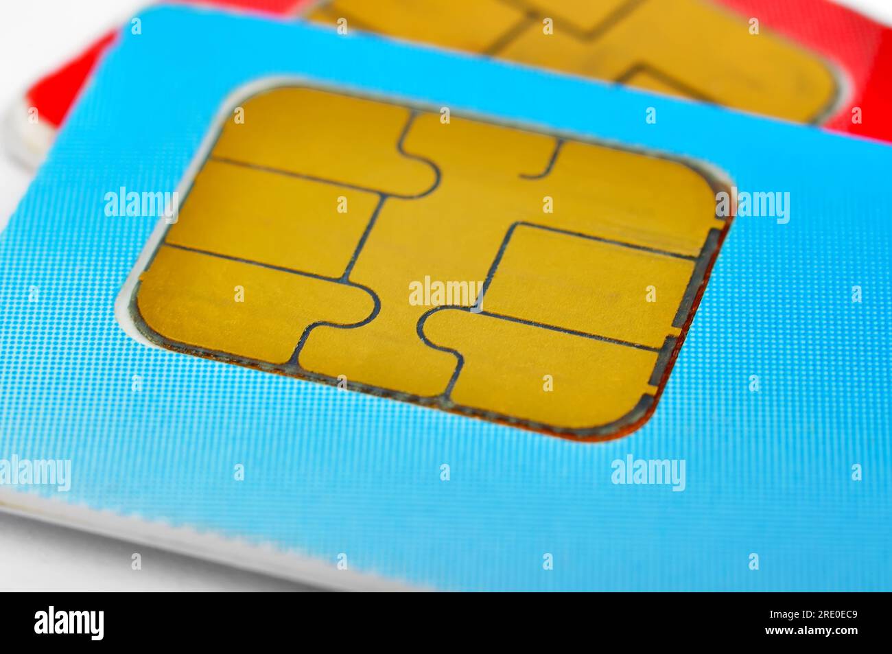 two color sim cards on a white background Stock Photo - Alamy