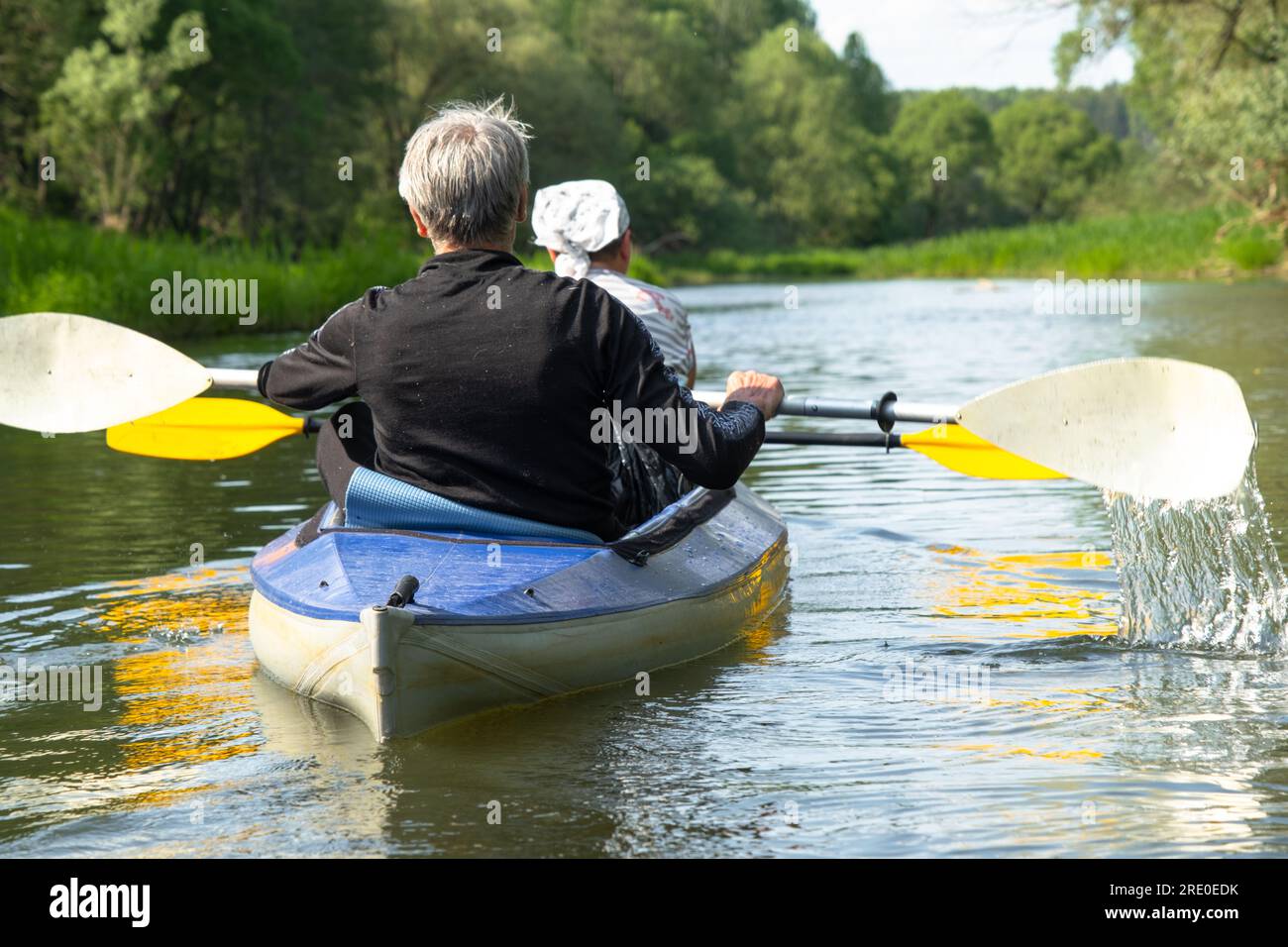 Family kayak trip for seigneur and senora. An elderly married couple ...