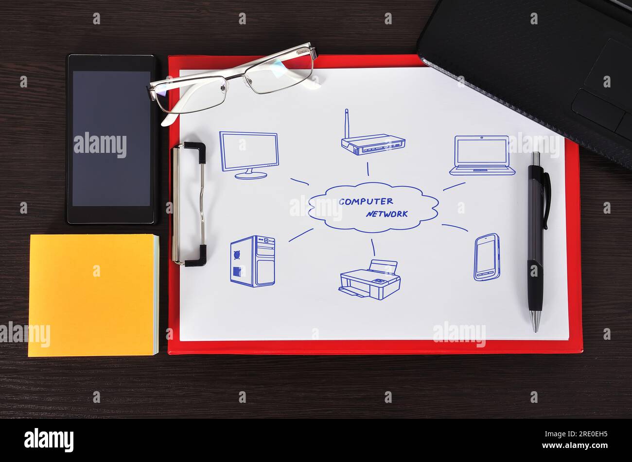 clipboard with computer network on table and business object Stock ...