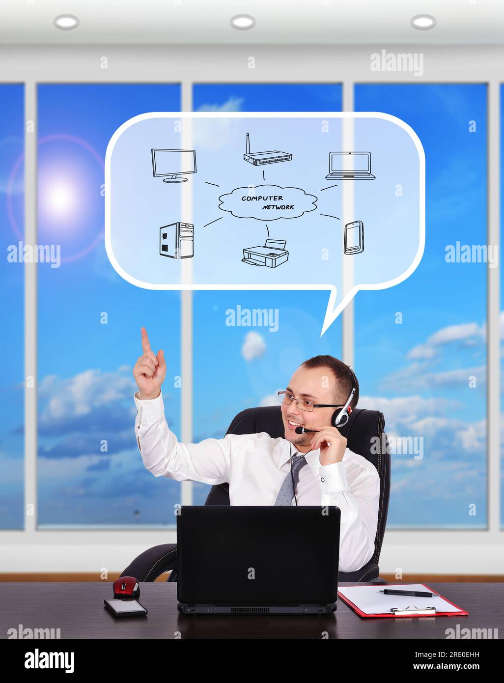 manager tells clients on phone aboutcomputer network Stock Photo - Alamy