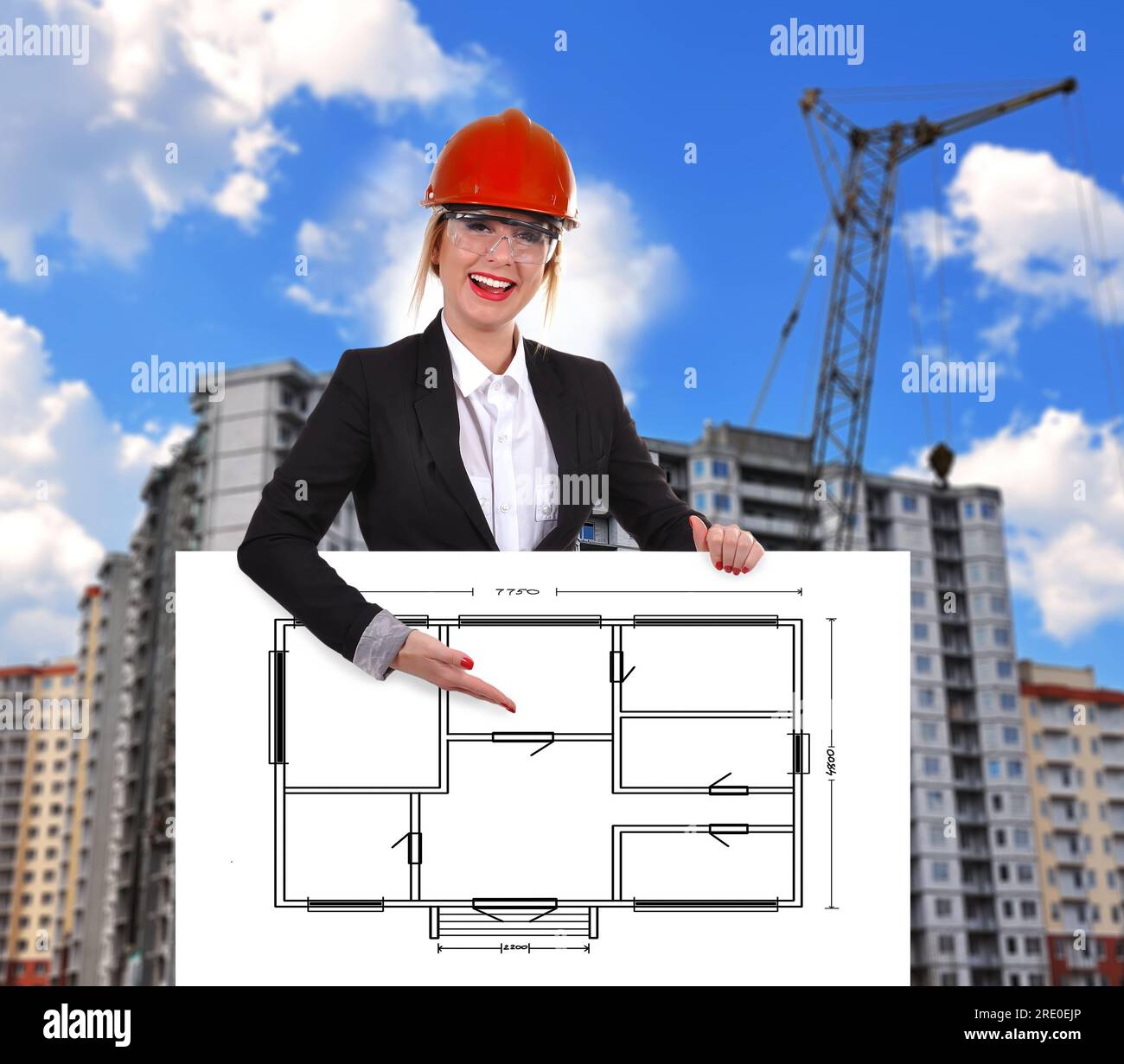 Engineer woman holding placard with drawing blueprint Stock Photo - Alamy
