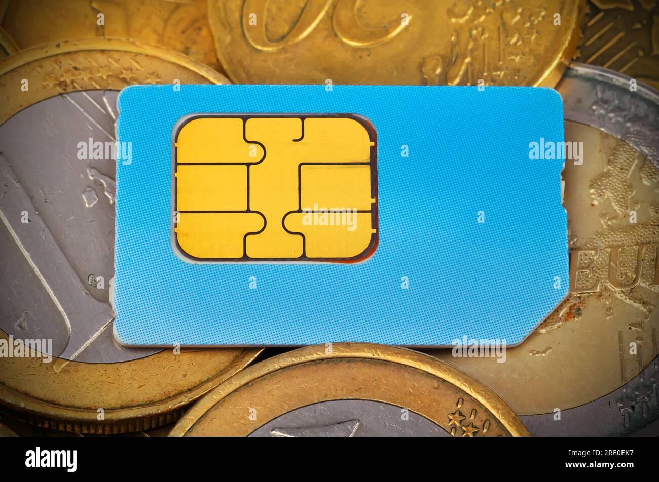sim card and euro coins money, close up Stock Photo - Alamy