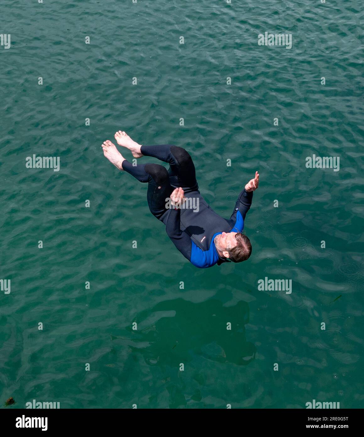 Male diving into sea hi-res stock photography and images - Alamy