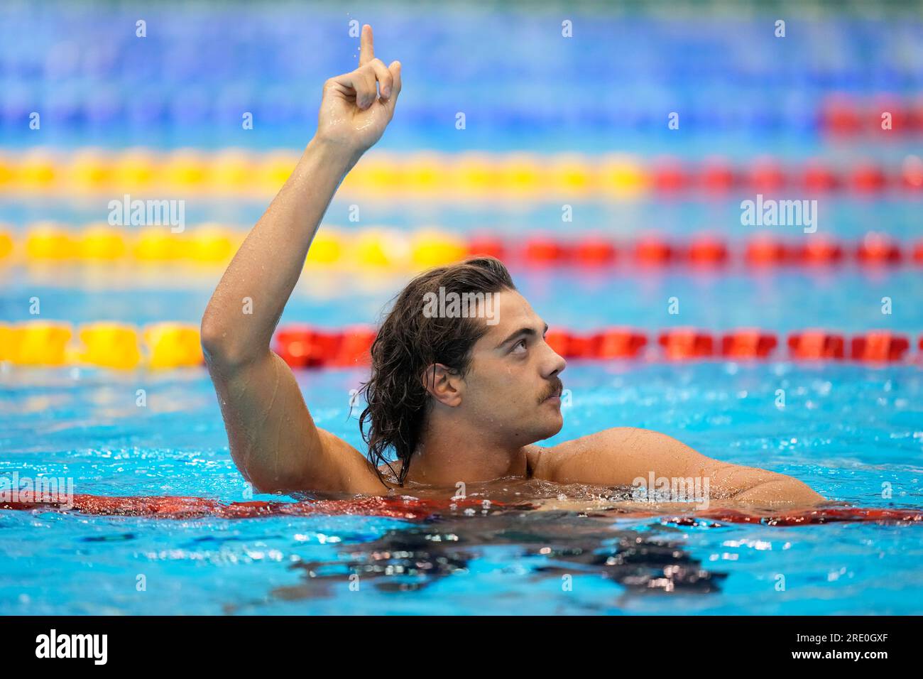 Thomas Ceccon of Italy celebrates after winning the men's 50m butterfly ...