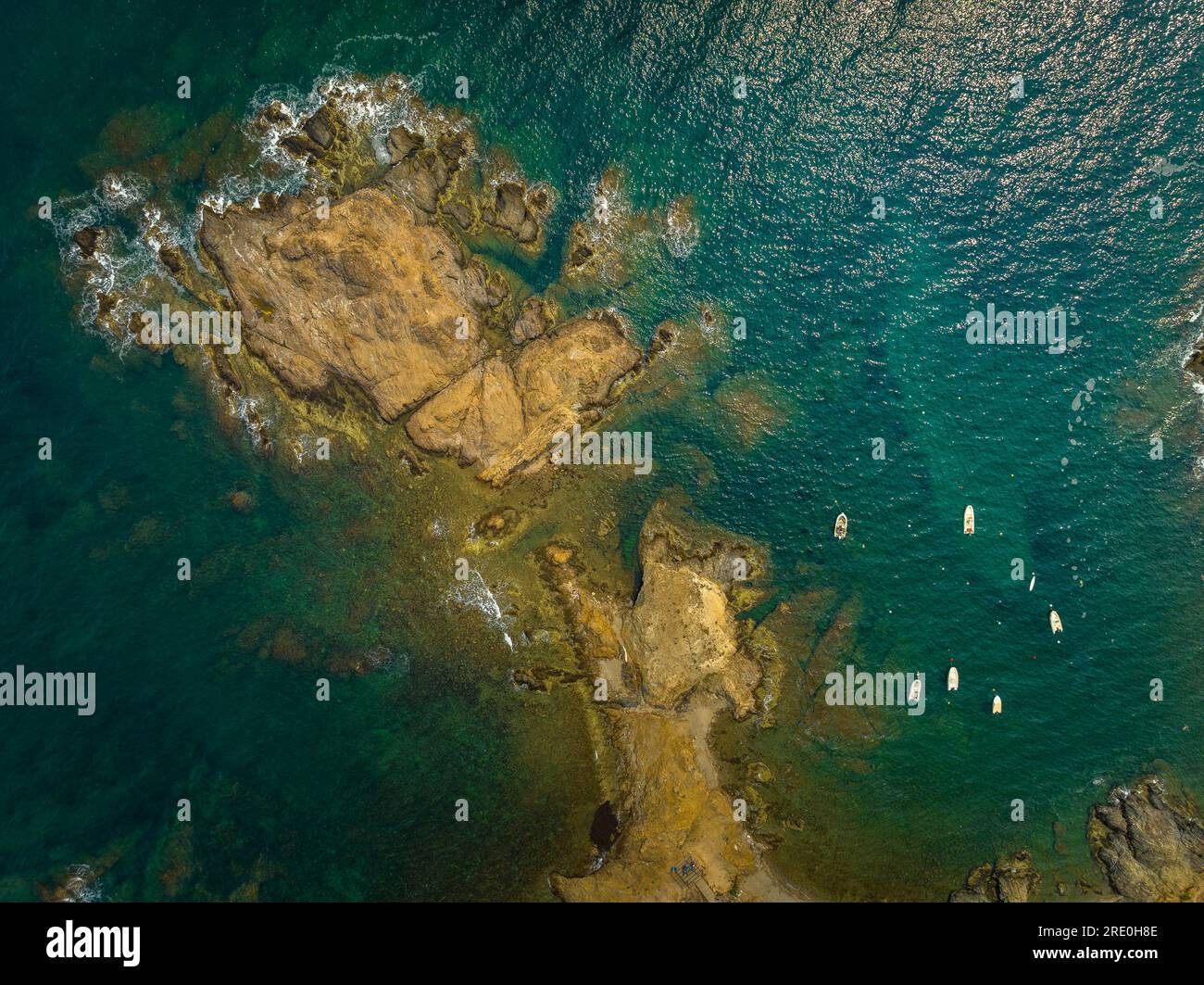 Aerial view of the island of Cap de Bol cape, near Port de la Selva, in ...