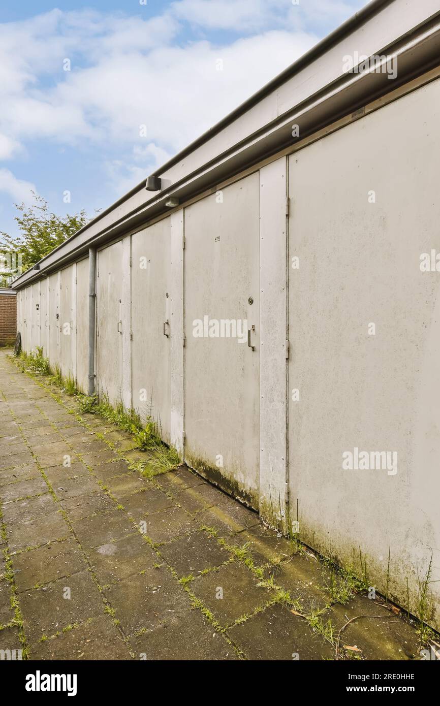 an empty alley with no people or vehicles to see in the photo, it's ...