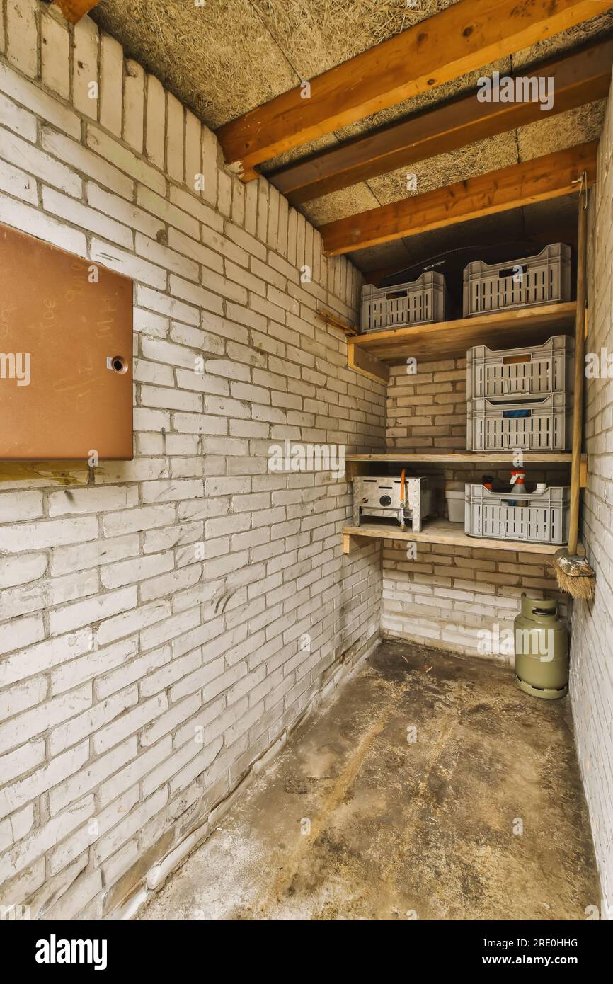 the inside of a building with some boxes on the wall and shelves in the ...