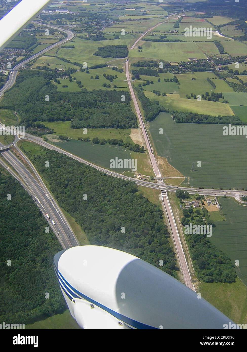 Aerial view looking down on the M20 and high speed railway line near ...