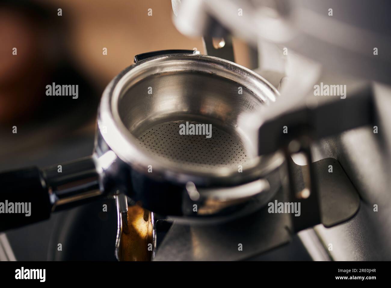 metallic portafilter, coffee machine, close up, coffee extraction ...