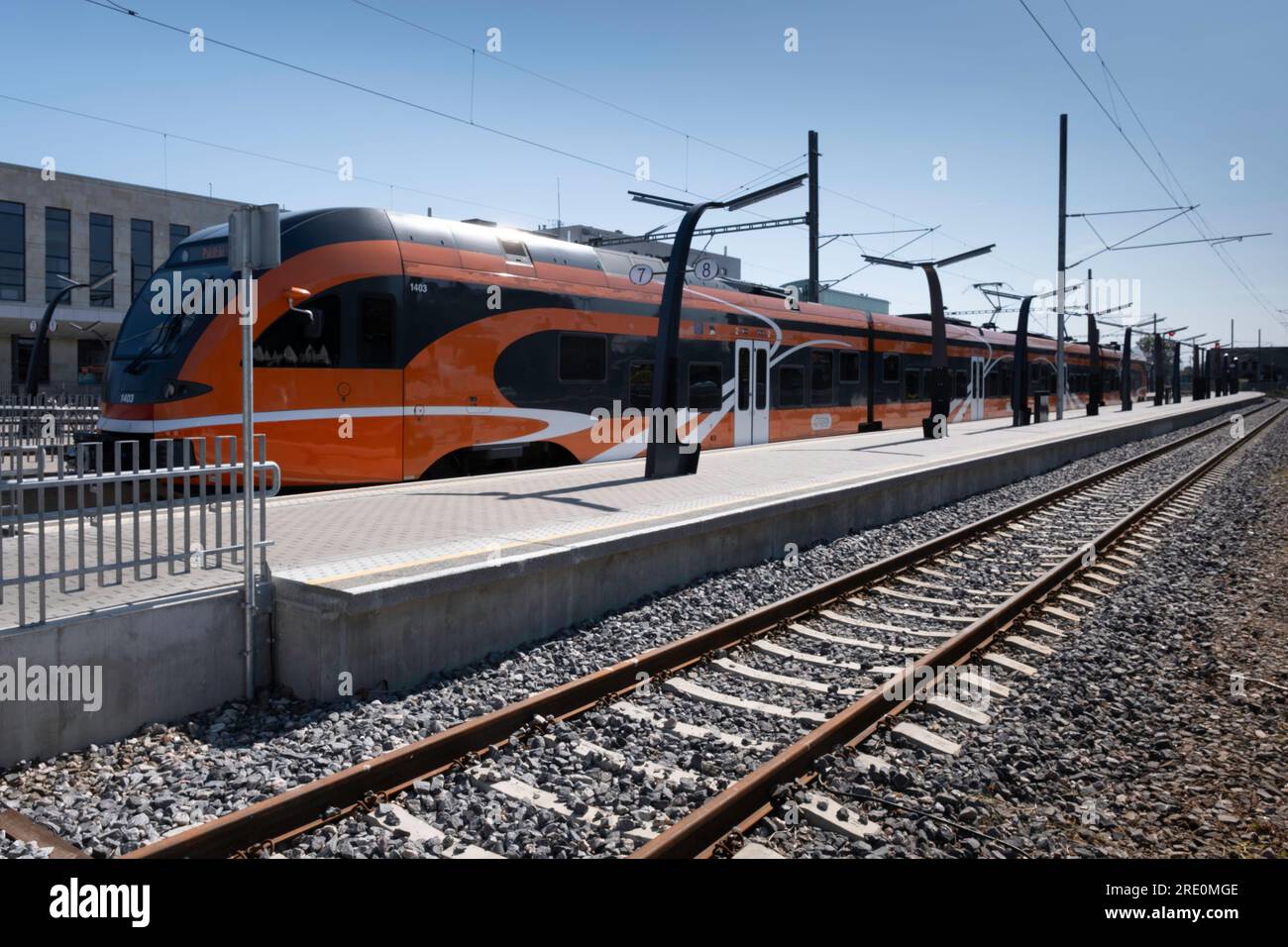 Modern passenger electric train arrives at the station in Tallinn Stock ...