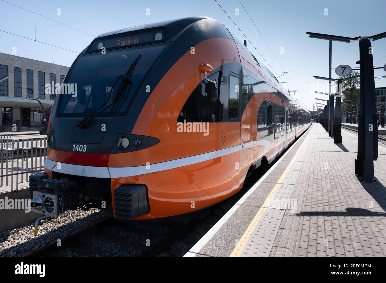 Modern passenger electric train arrives at the station in Tallinn Stock ...