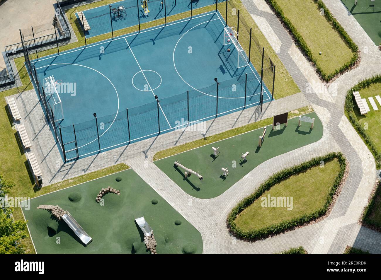 High angle of part of large yard with modern sports ground for playing ...