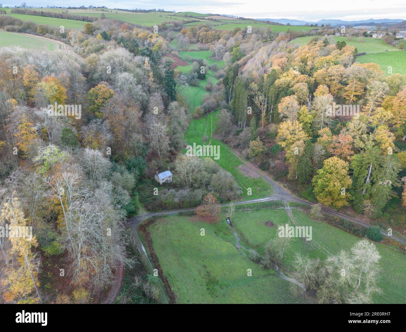 Aerial views of farmland and farm machinery in the Clun Valley ...