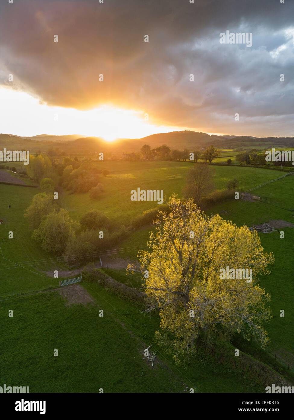 Aerial views of farmland and farm machinery in the Clun Valley ...