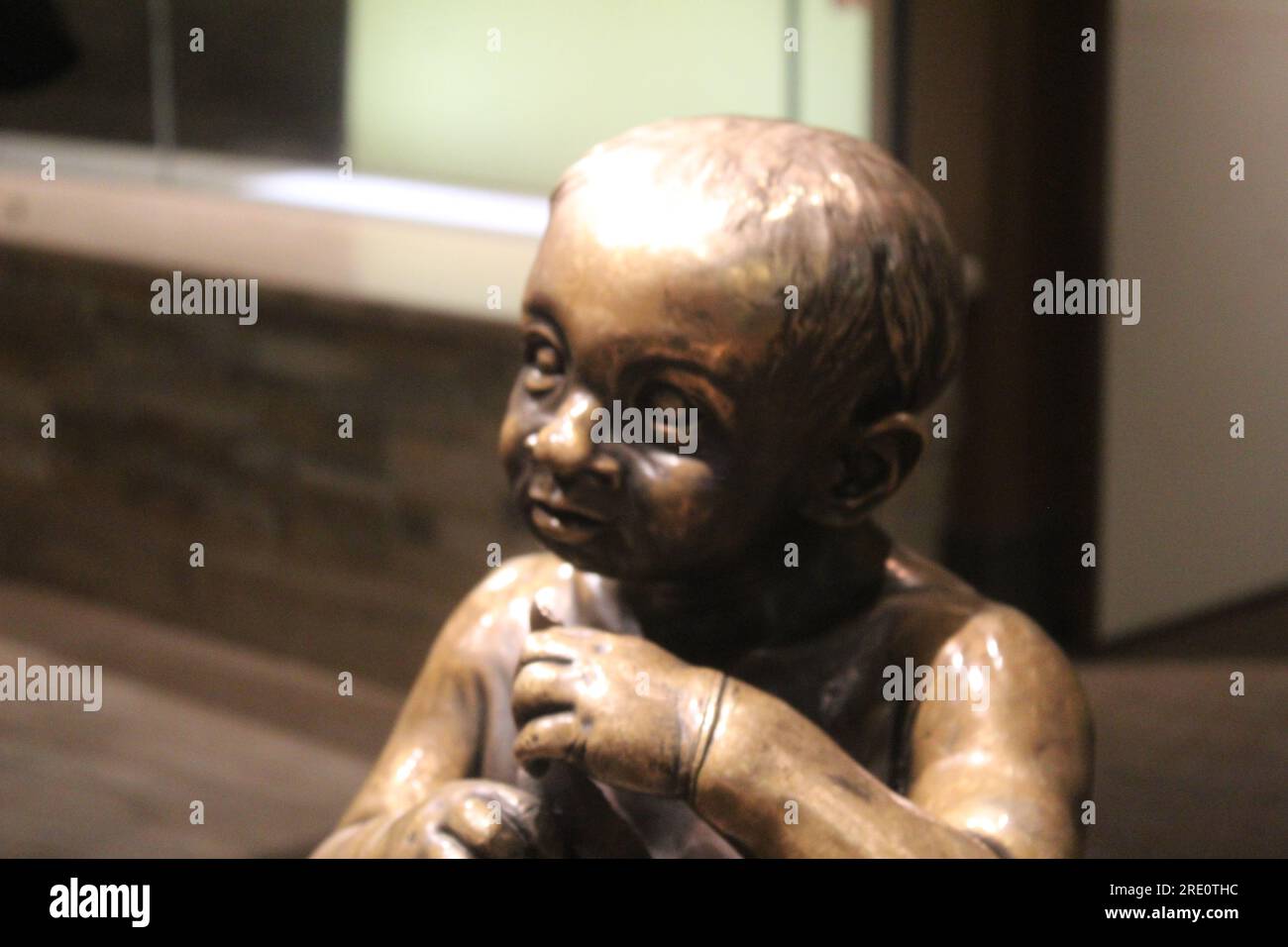 A photo of a statue of a child in the Natural History Museum in ...