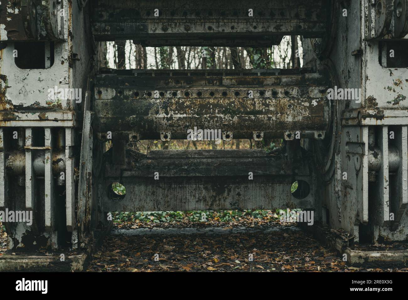 Detail of an old abandoned and rusted sheet metal working machine in ...