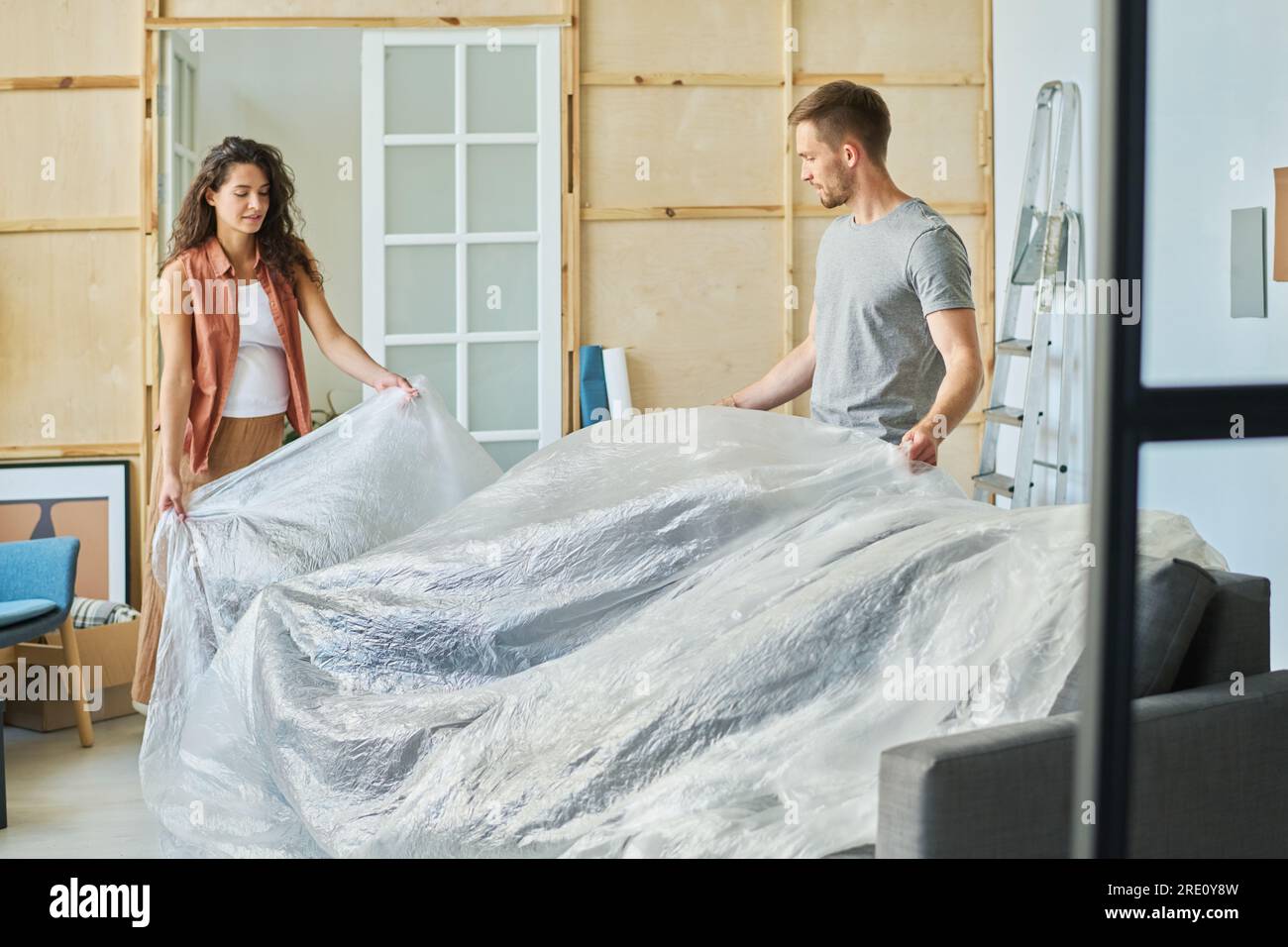 Gen z couple sofa hi-res stock photography and images - Alamy