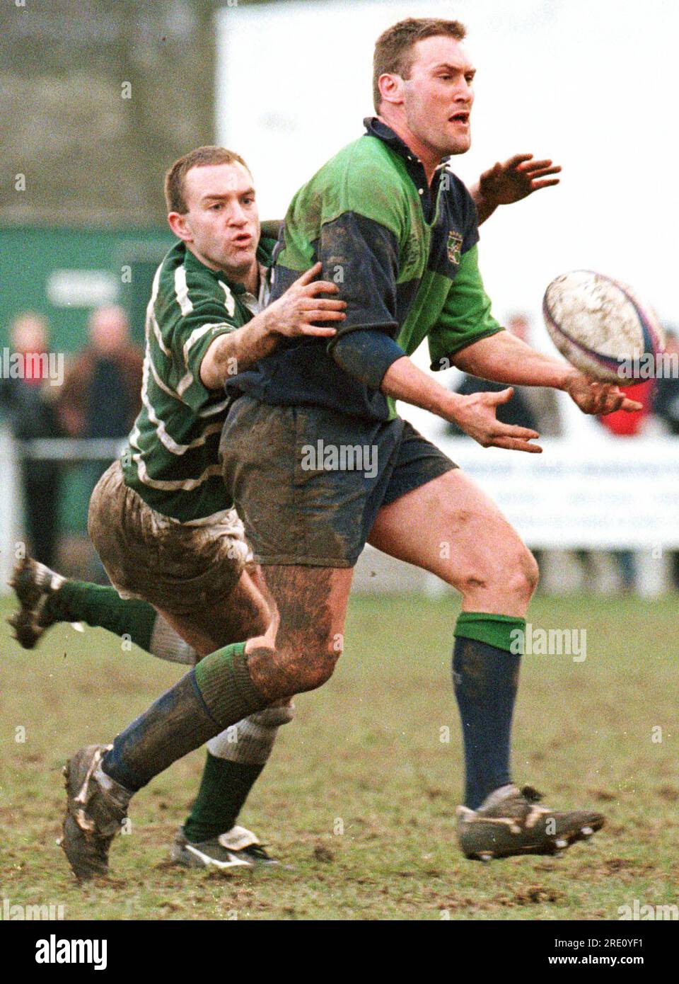 HAWICK V BOROUGHMUIR. 13/2/99. Muirs Lindsay Graham releases the ball as he is caught by Hawicks ...