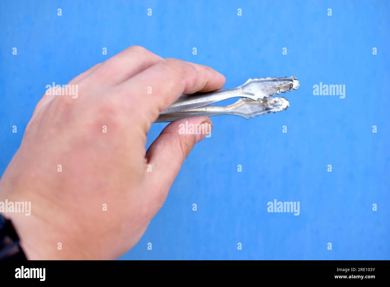 Hand tongs isolated hi-res stock photography and images - Alamy