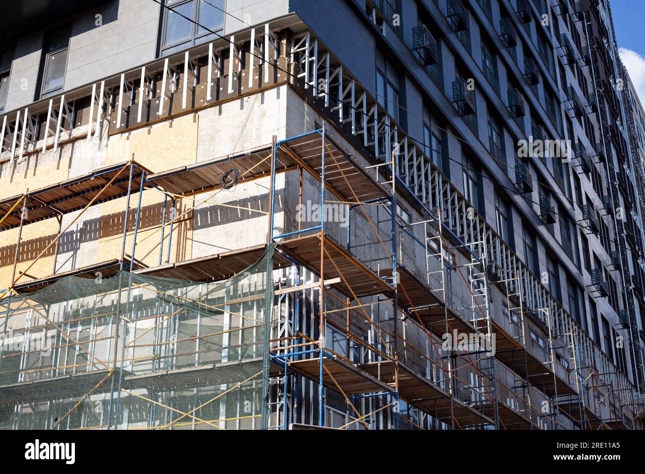 Extensive scaffolding providing platforms for work in progress on a new ...