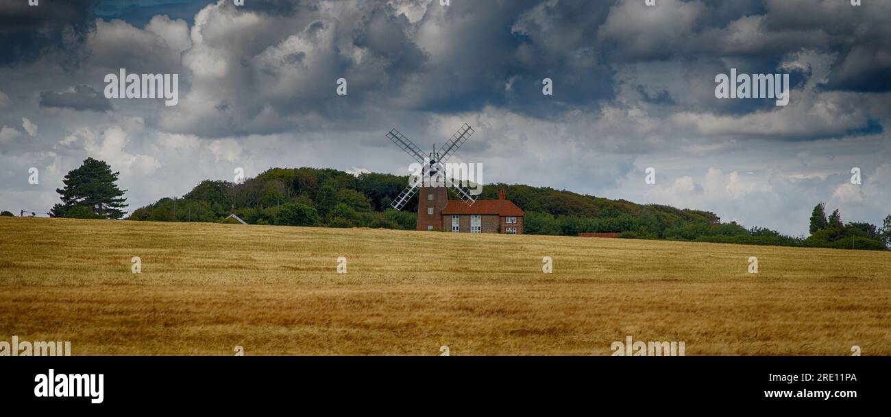 Windmill coast sails sky brick hi-res stock photography and images - Alamy