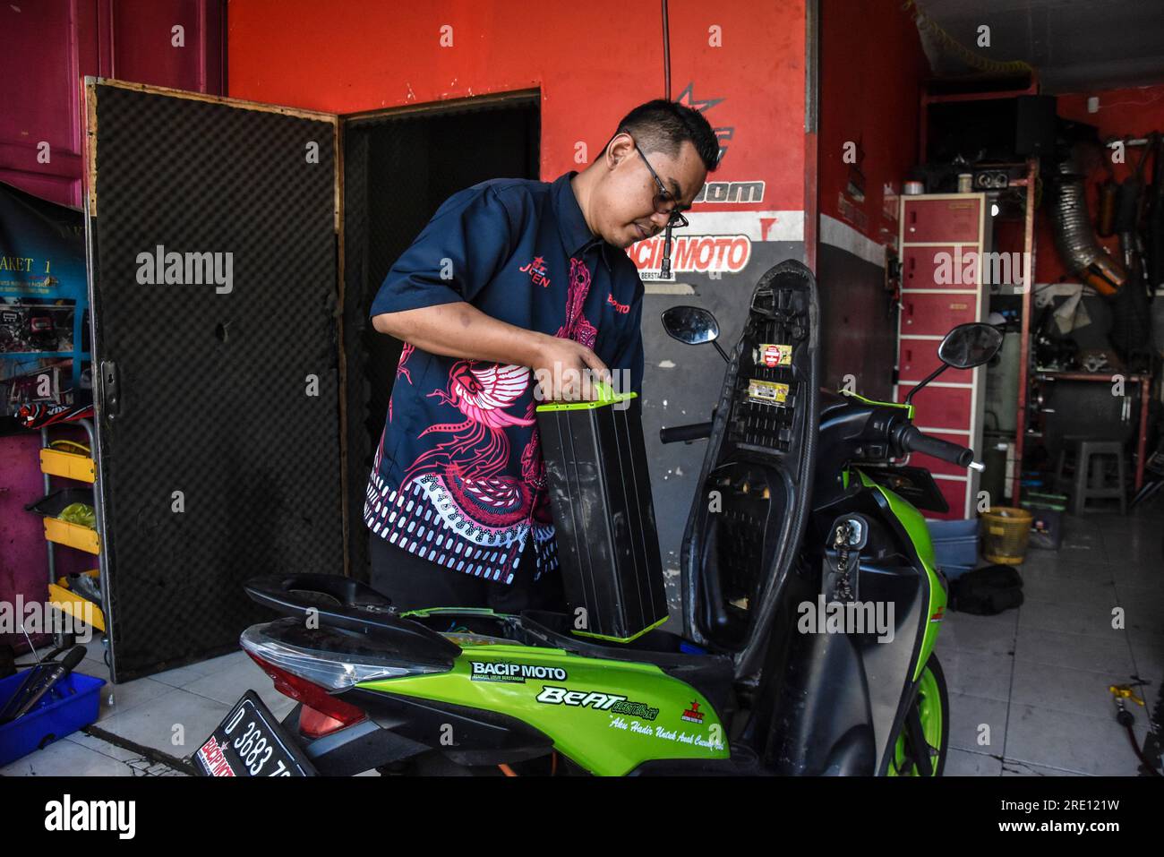 Bandung, West Java, Indonesia. July 24, 2023. Technician replaces ...
