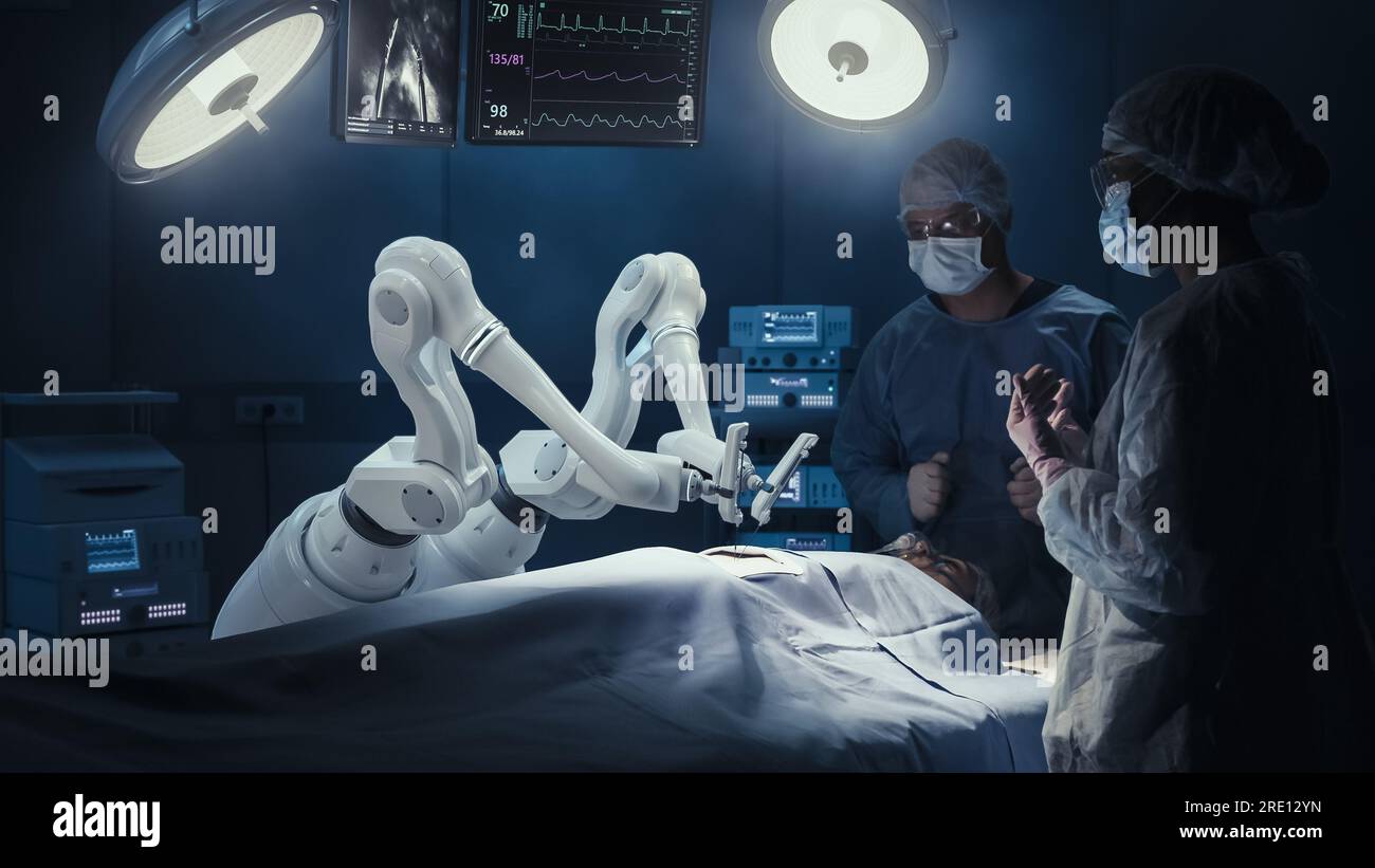 Two Surgeons Observing High-Precision Programmable Automated Robot Arms ...