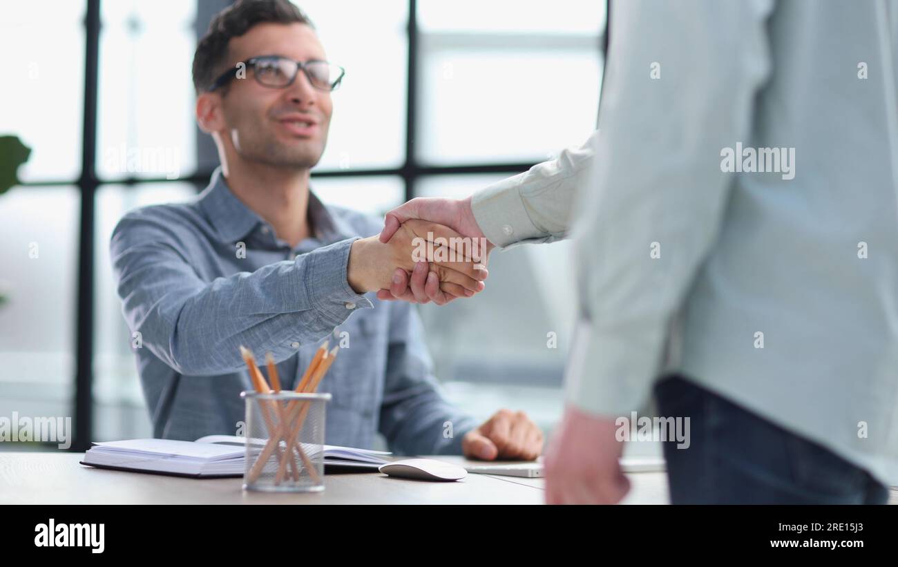 handshake and meeting in teamwork for partnership or collaboration in ...