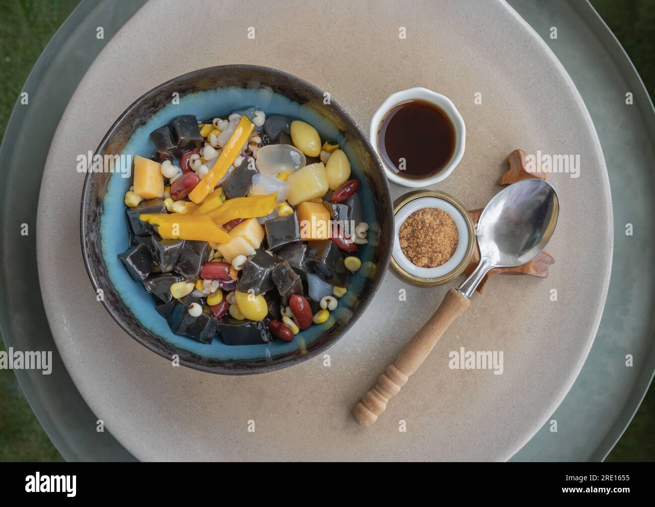 Black Grass Jelly is including Nuts, Cereals, Red beans, Ginkgo, Sliced ...