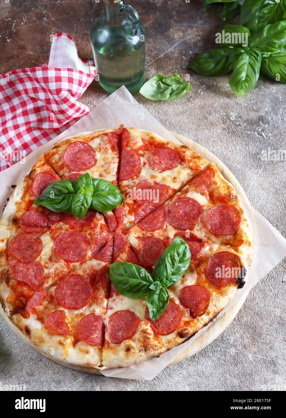 homemade pizza with pepperoni and basil Stock Photo - Alamy