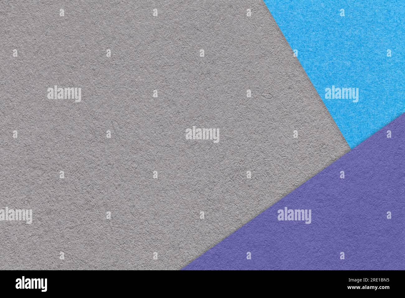 Texture of craft gray color paper background with blue and violet ...