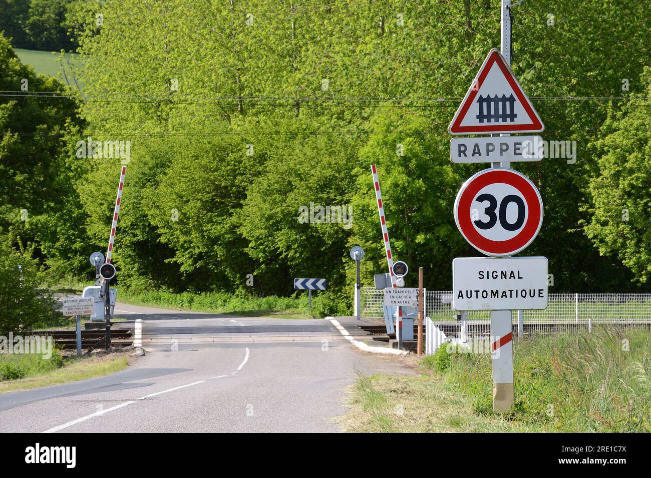 Level crossing on a country road with automatic railway gate Stock ...