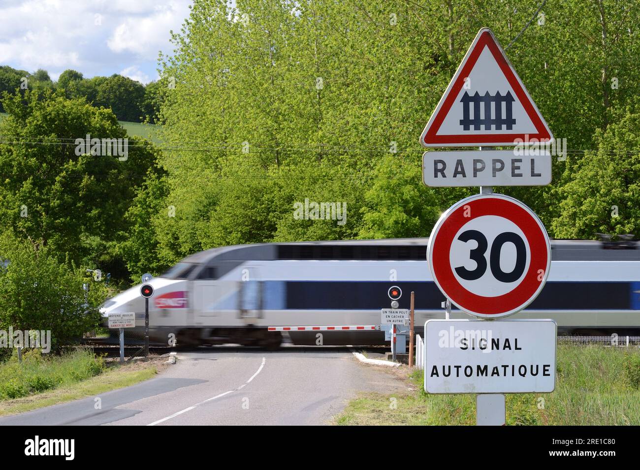 Level crossing on a country road with automatic railway gate. Level ... Level crossing on a country road with automatic railway gate. Level ...