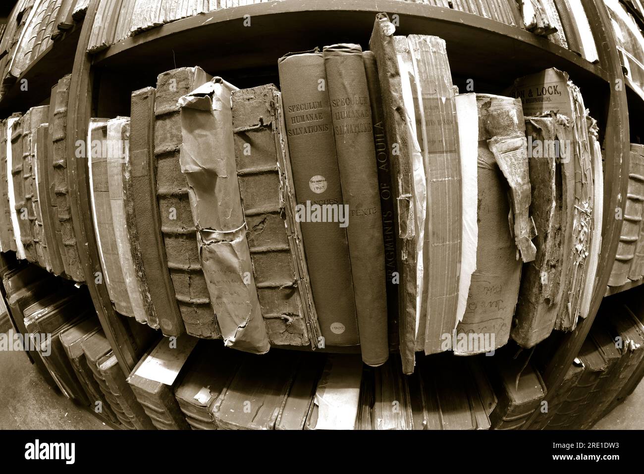 Antique books on library shelf Stock Photo - Alamy