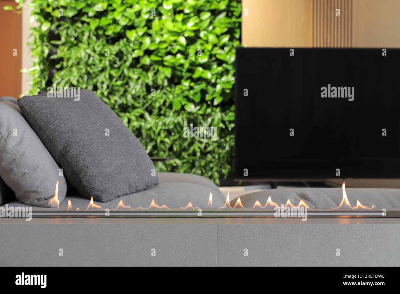 Burning modern eco bio ethanol fireplace in the living room Stock Photo ...