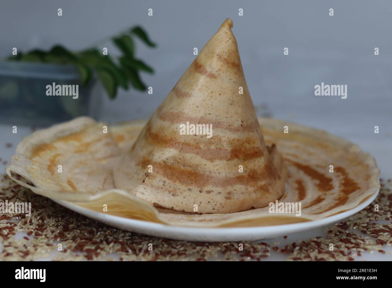 Rajamudi rice ghee roast in cone shape. Crispy crapes made with ...
