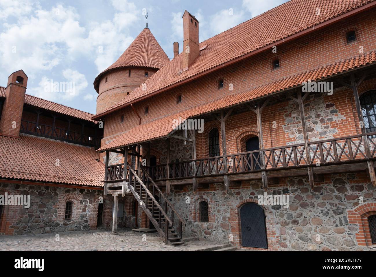 Old Trakai Castle with its wooden stair galleries and corner tower in ...