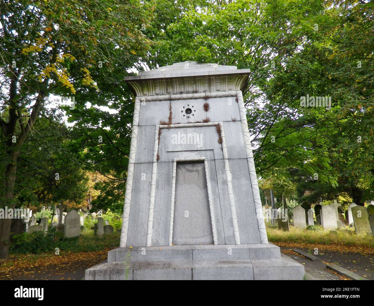 a stone monument in a cemetery Stock Photo - Alamy