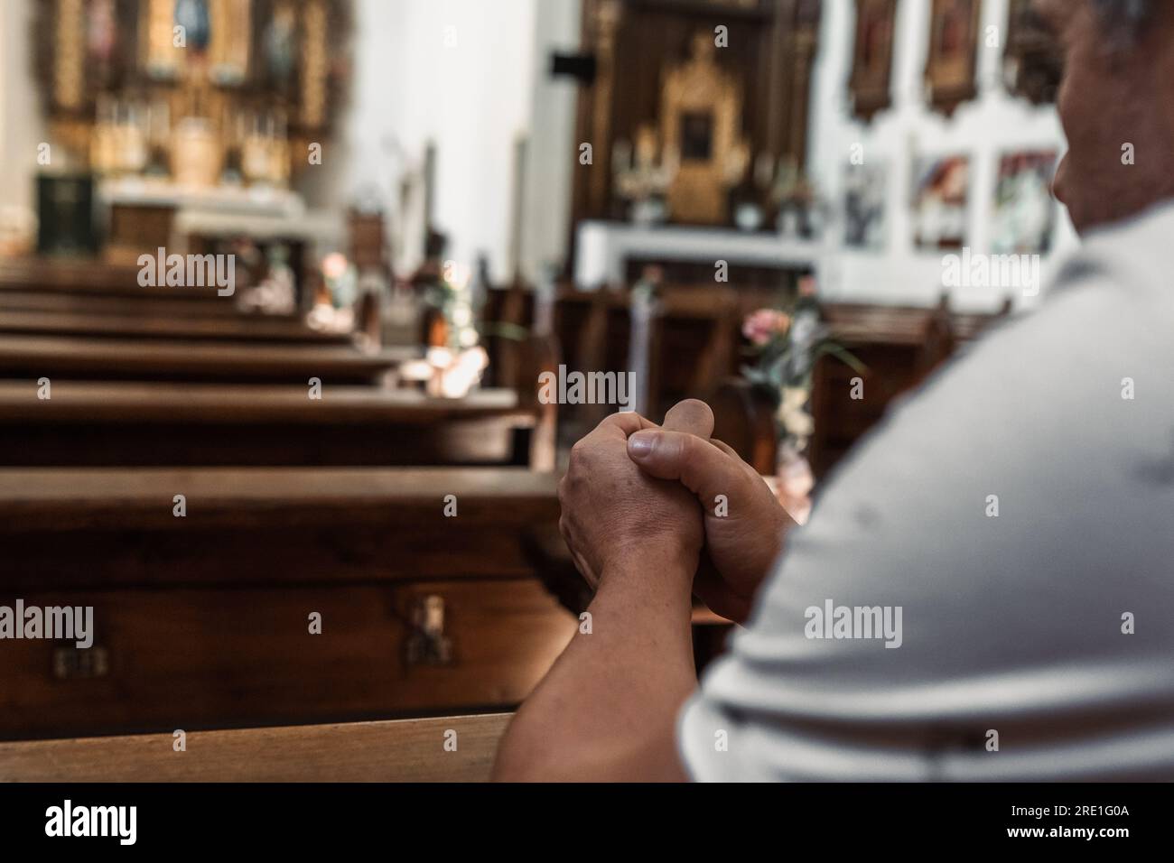 man praying in church Stock Photo - Alamy