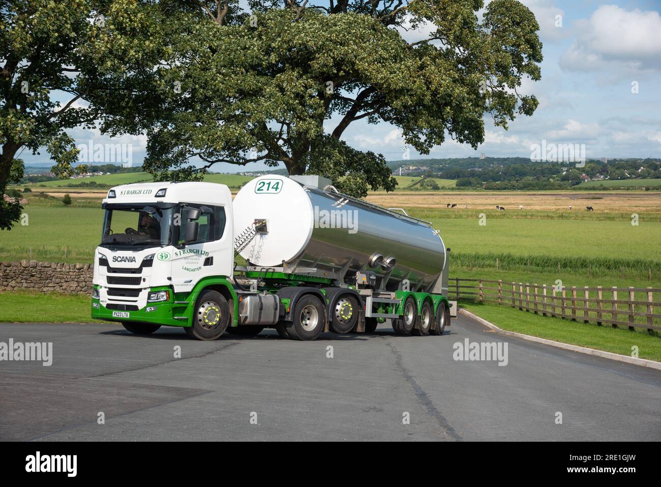A milk tanker pulling up to a farm, Lancashire, UK Stock Photo - Alamy