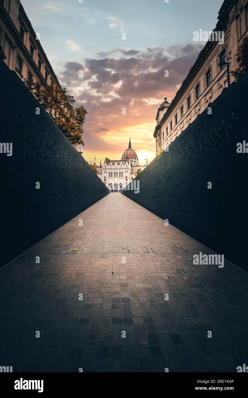 Budapest Hungary. The Parliament and Trianon Monument at sunset. a ...
