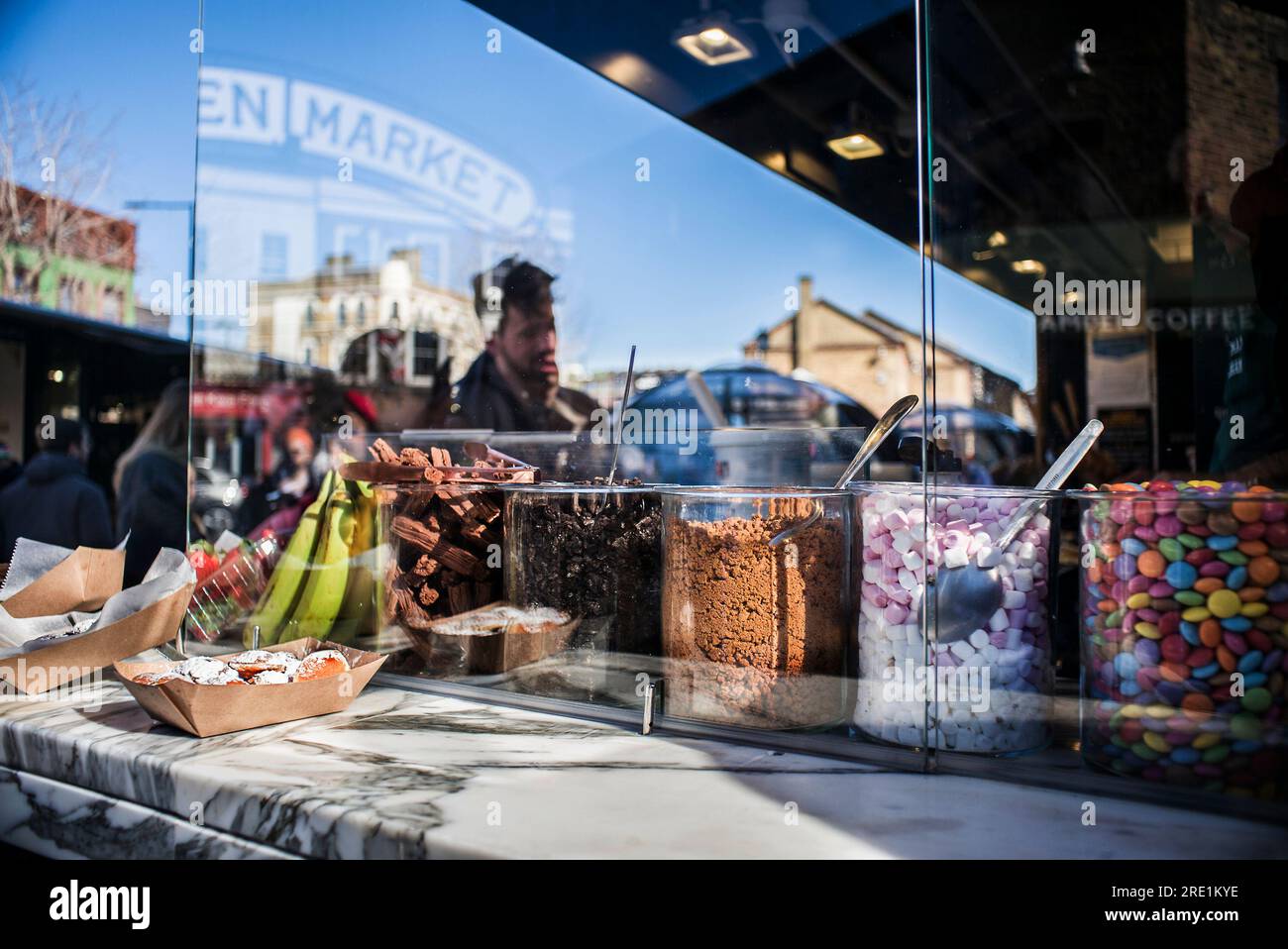reflections in sweet shop window Camden market Stock Photo - Alamy