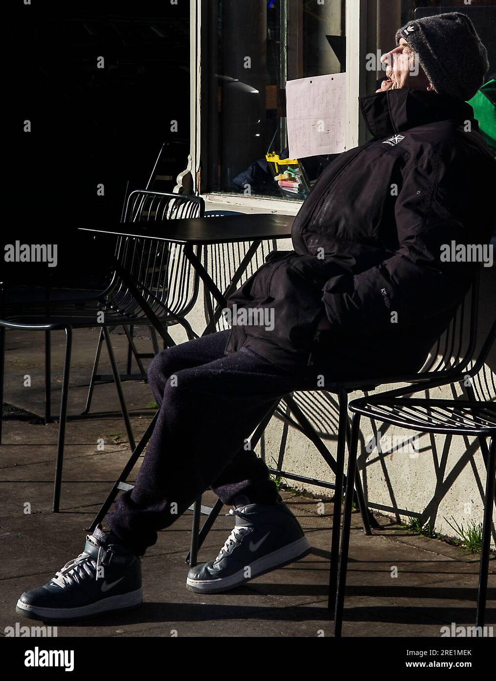 Elderly man sunbathing hi-res stock photography and images - Alamy
