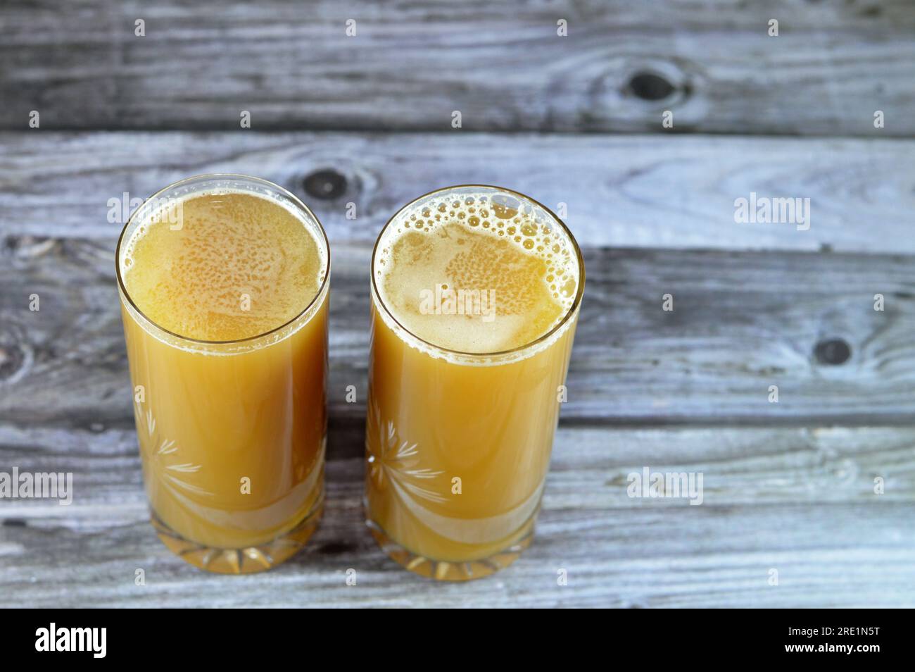 Sugarcane juice, the liquid extracted from pressed sugarcane. It is ...