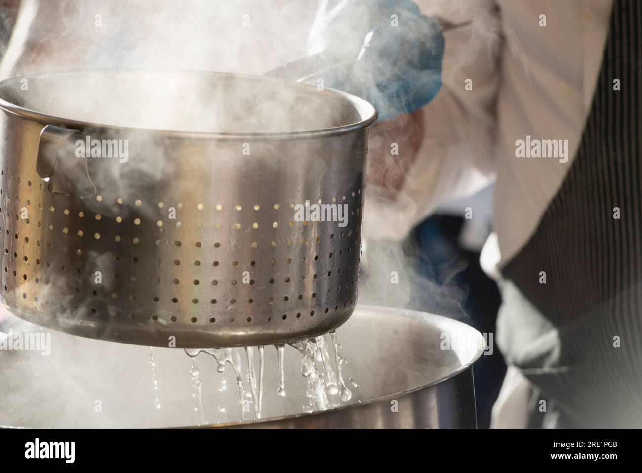 Italy, Street Food Festival, Cooking Pasta in Boiling Water Stock Photo ...