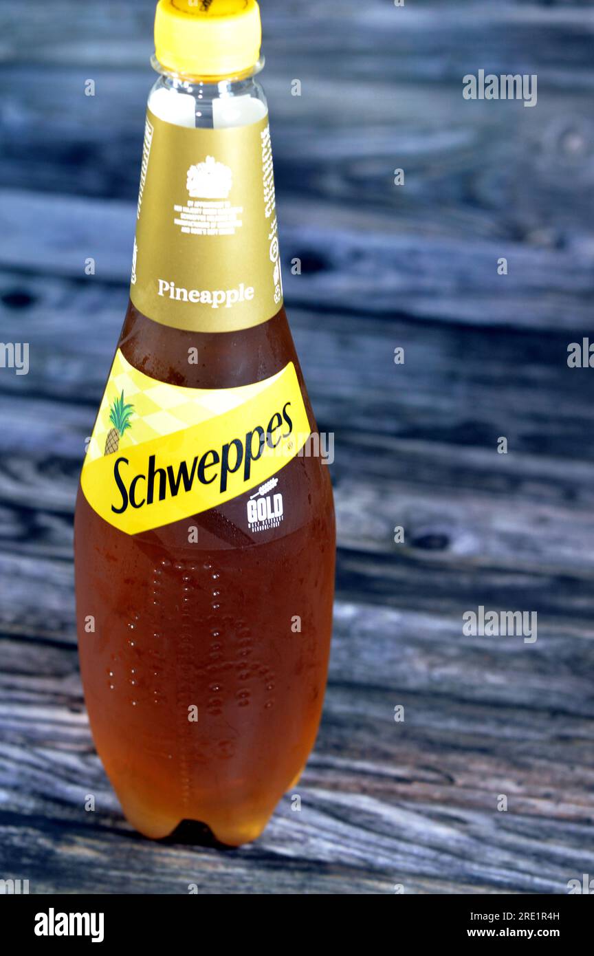 Giza, Egypt, July 21 2023: Schweppes Gold soft drink contains pineapple ...