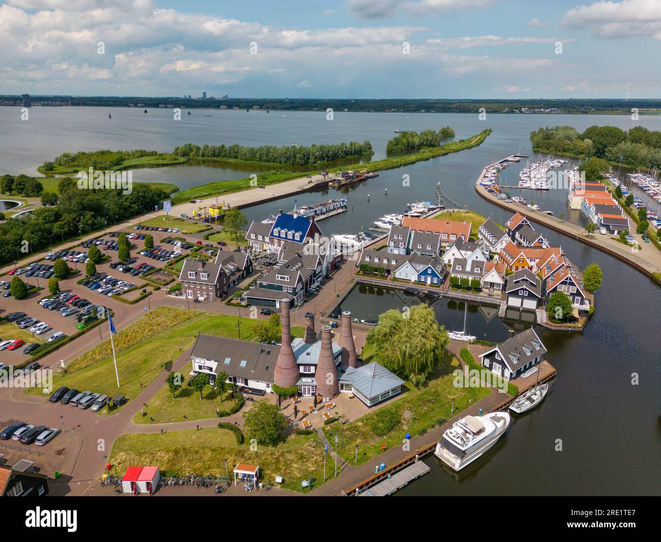 Aerial drone photo of the dutch town Huizen in Utrecht. It has a large ...