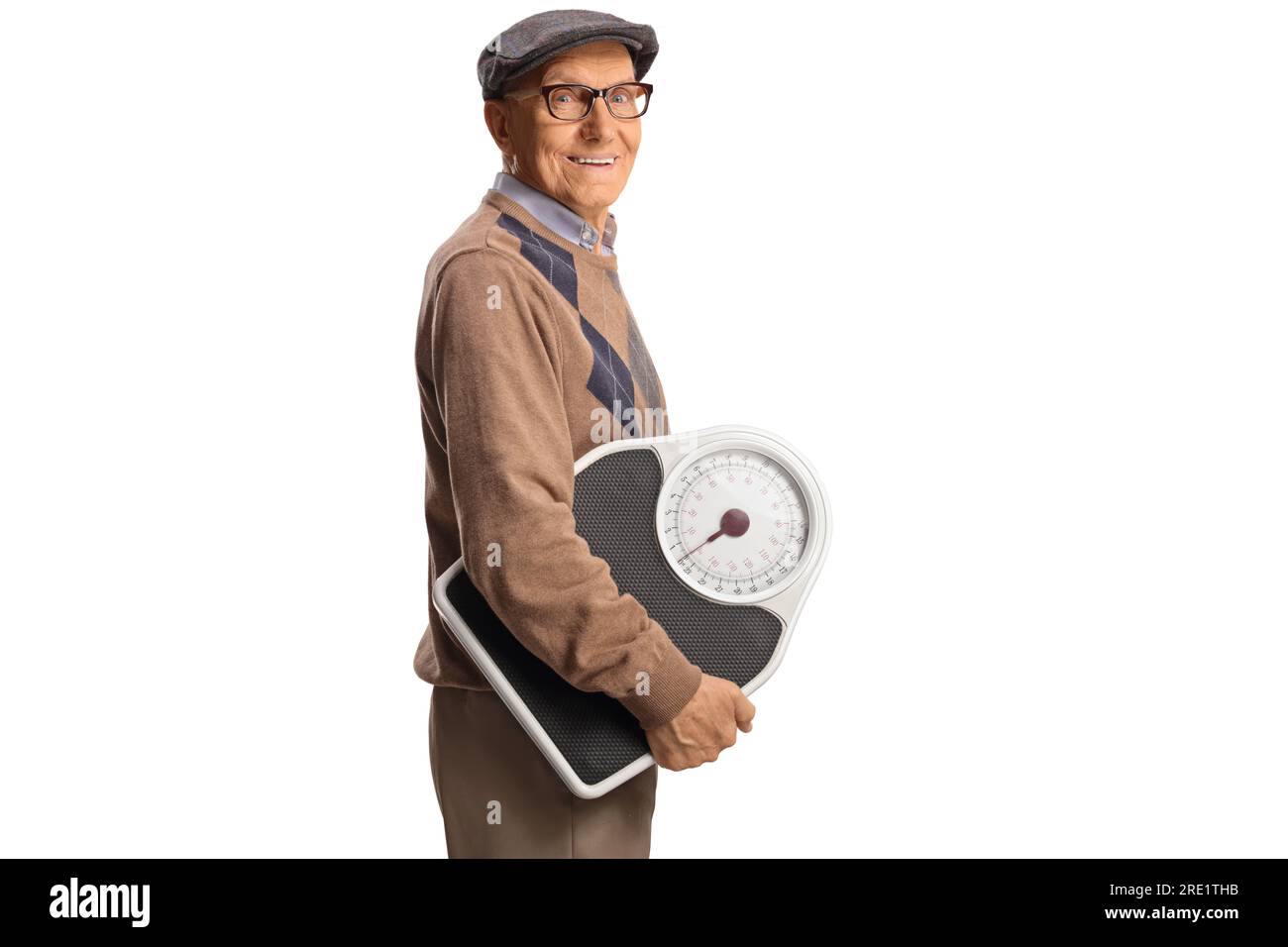 Elderly man holding a weight scale and smiling isolated on white ...