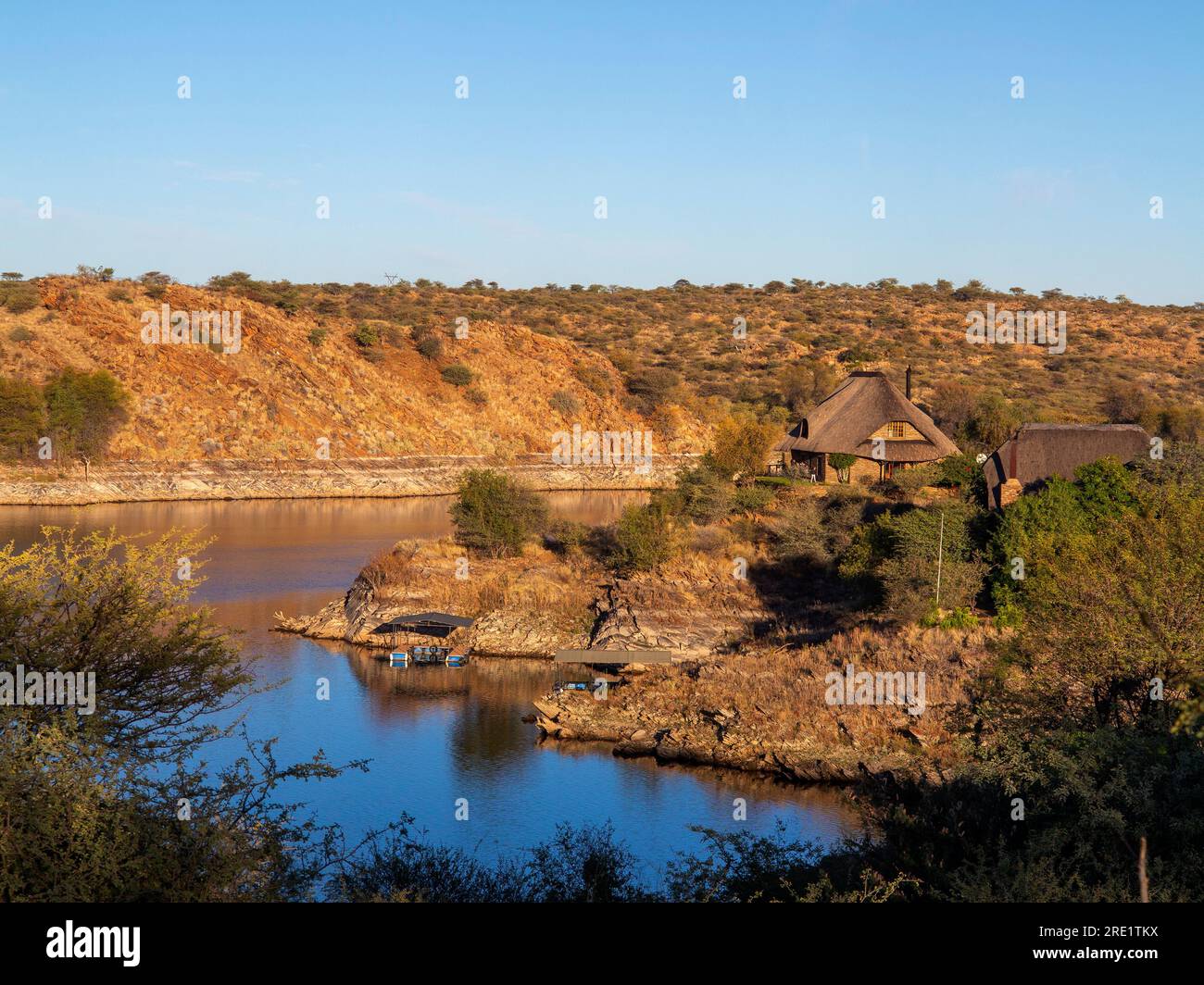 Beautuful bungalow at the shores of Lake Oanob Resort, Namibia Stock ...