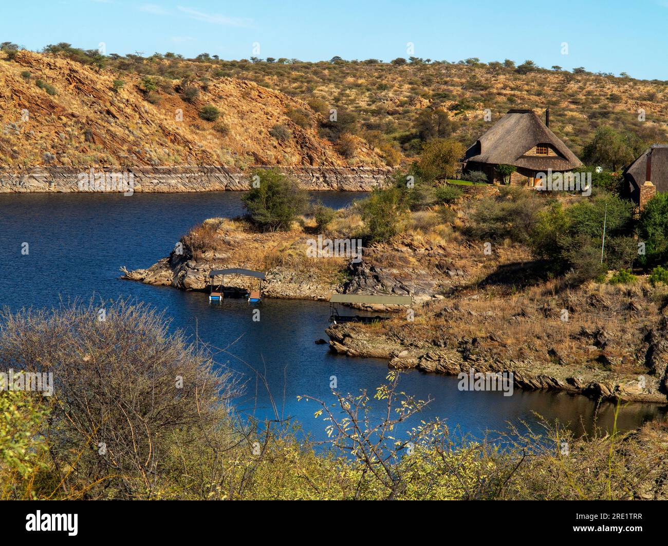 Beautuful bungalow at the shores of Lake Oanob Resort, Namibia Stock ...